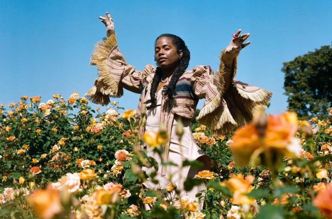 Akwaeke Emezi Looks Fabulous in Sunny Photoshoot in a Field of Flowers